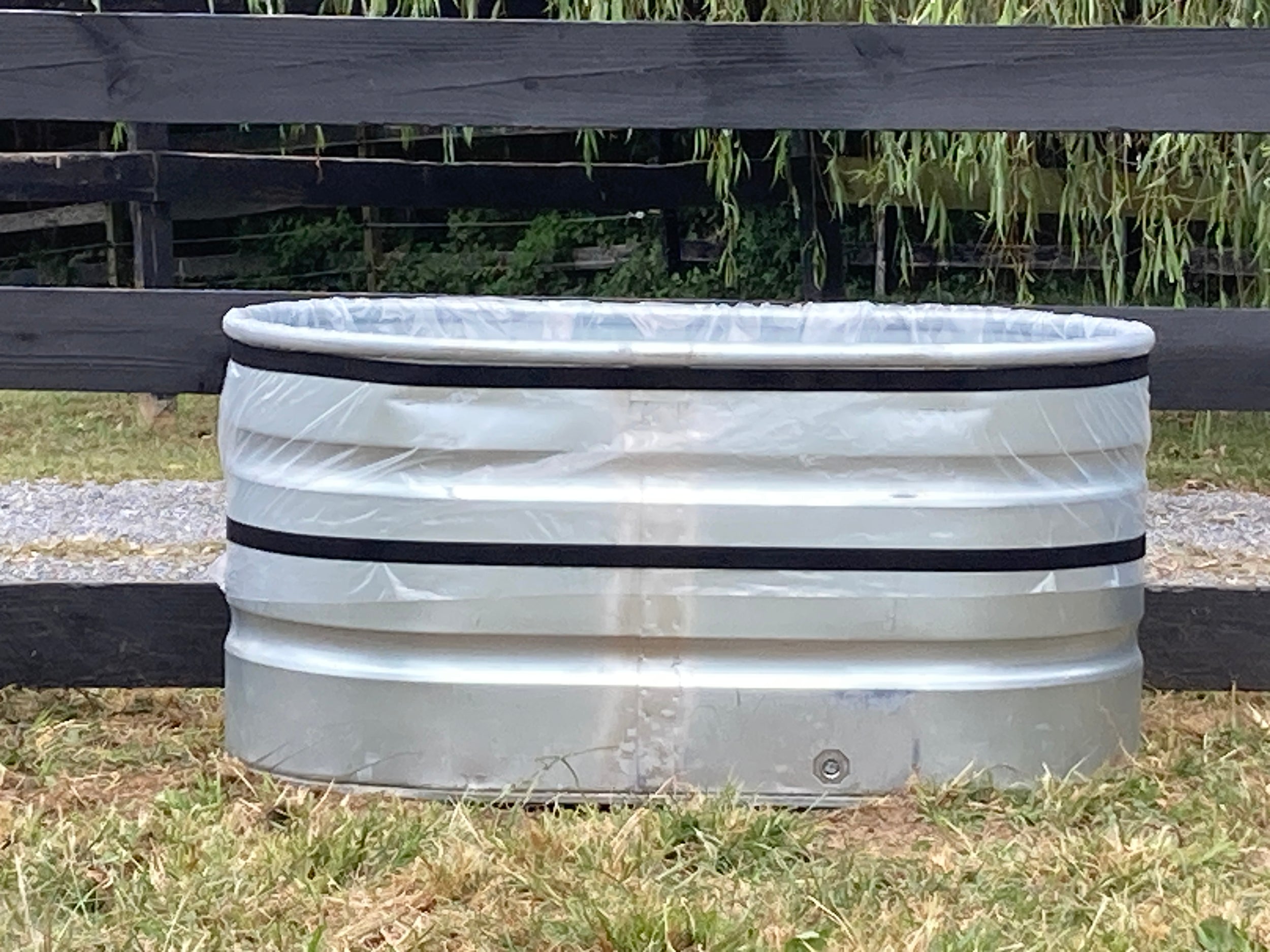 Step 4. Add both elastic bands to the outside of the tank